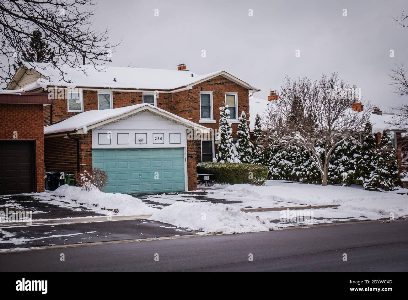 suburban home canada winter Stock Photo - Alamy