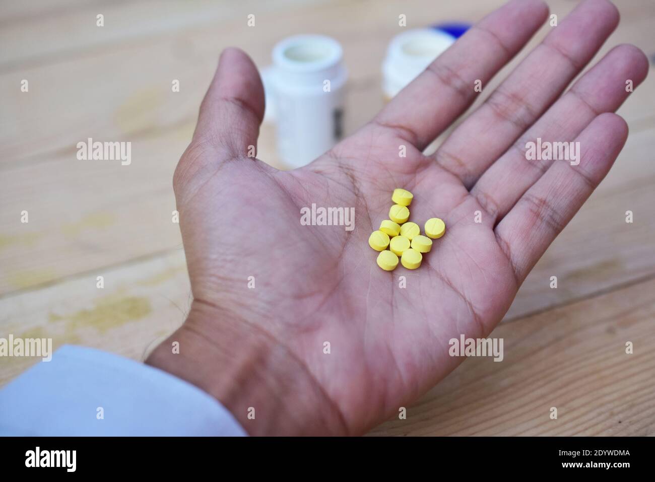Pill young women orange hi-res stock photography and images - Alamy
