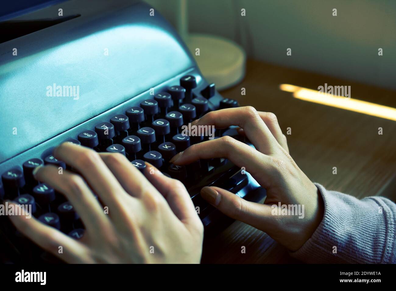 People typing on old keyboard for letter Stock Photo - Alamy
