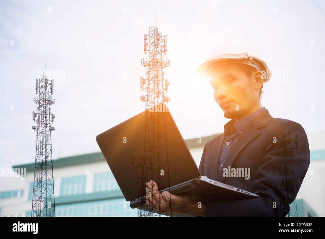 Double exposure Businessman holding computer notebook and Telephone and ...