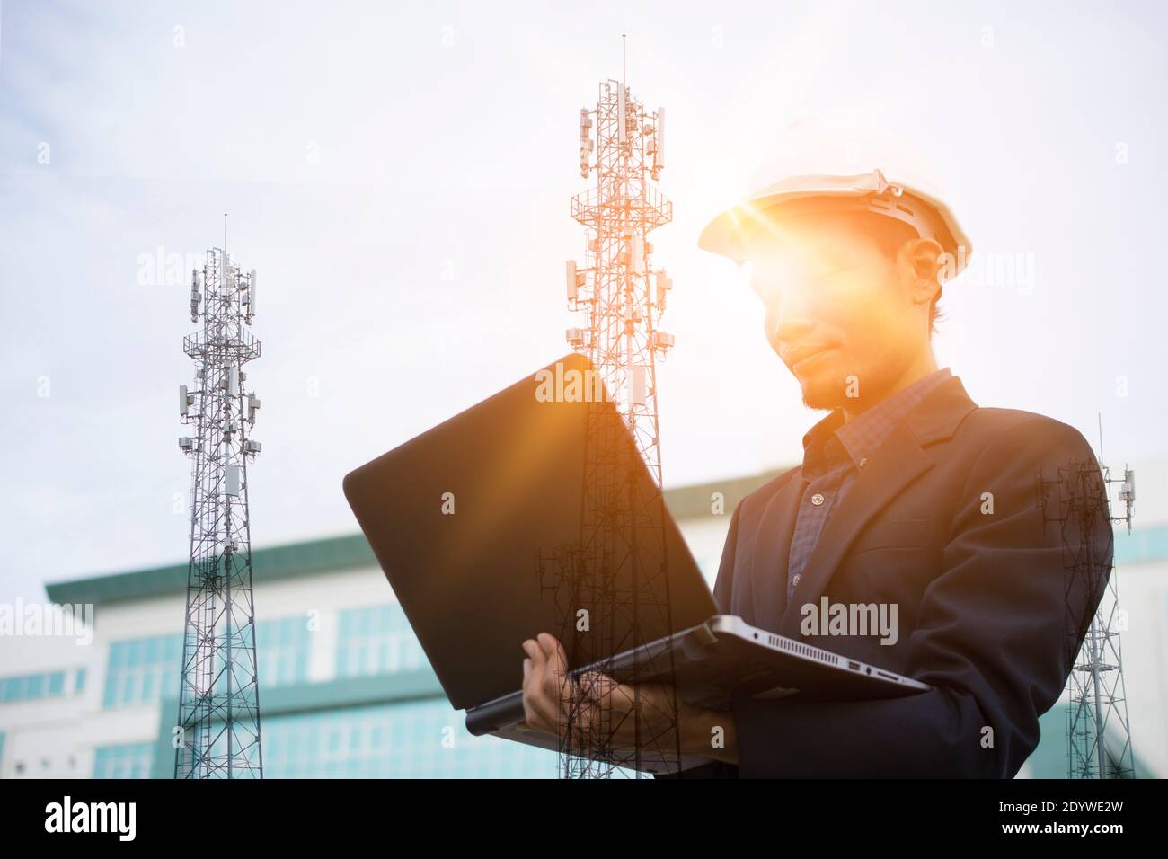 Double exposure Businessman holding computer notebook and Telephone and ...