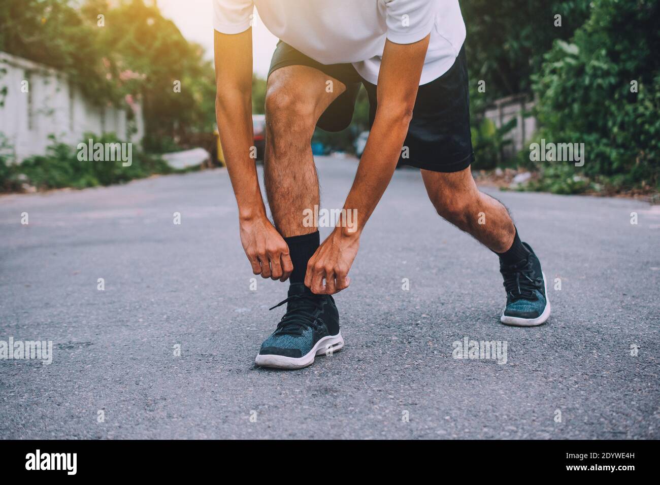 Runners tied in shoes,Man run on the street be running for exercise,Run ...
