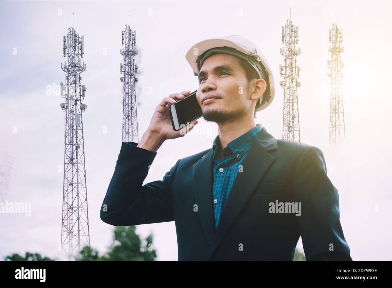 Engineer holding Mobile smart phone technology internet concept and ...