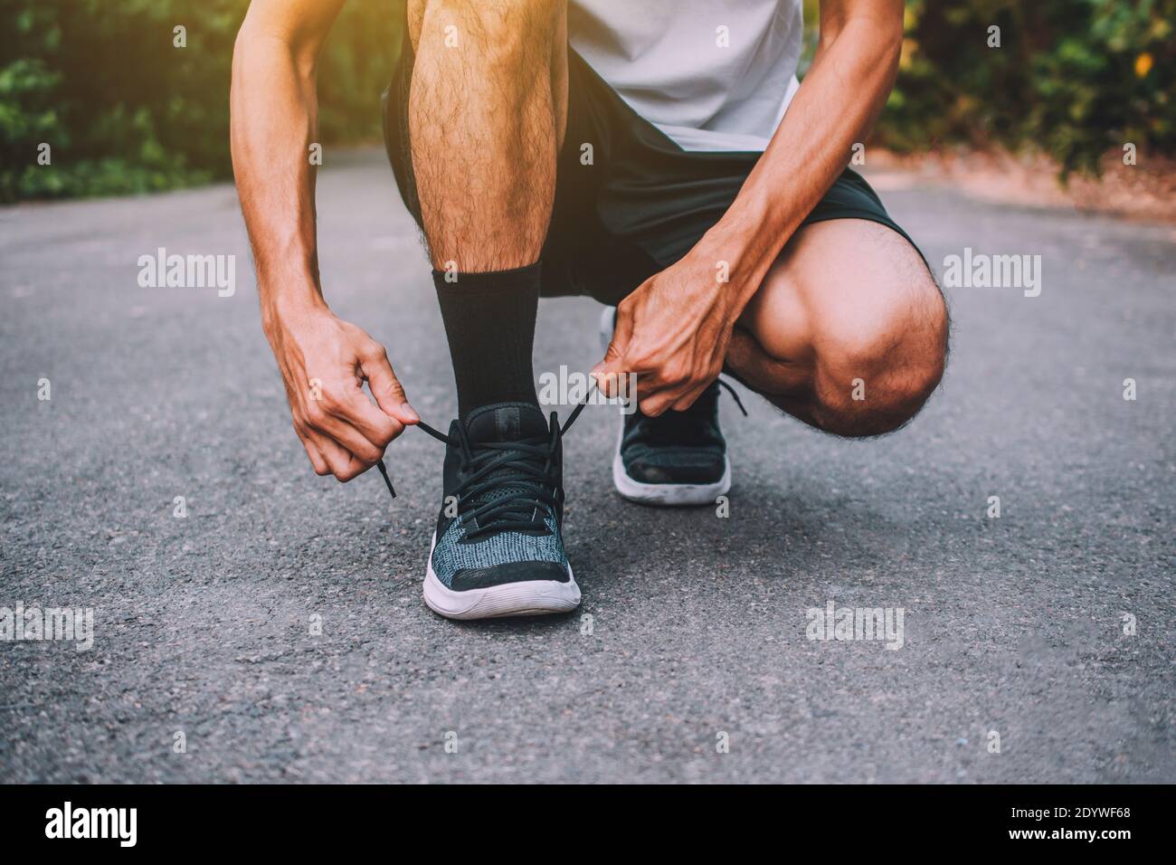 Runners tied in shoes,Man run on the street be running for exercise,Run ...