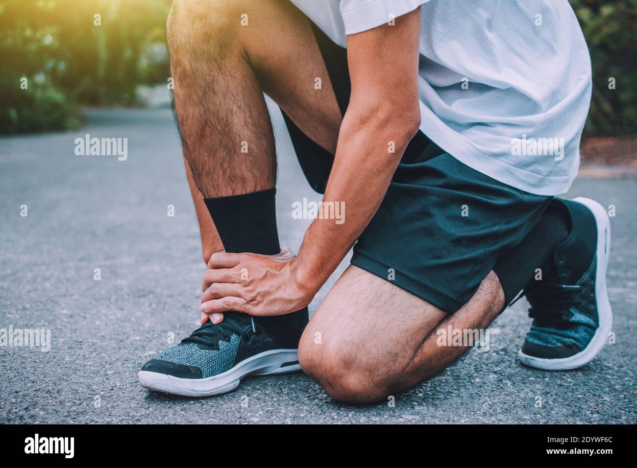 Runner injured in the foot while jogging space patella sore on road ...