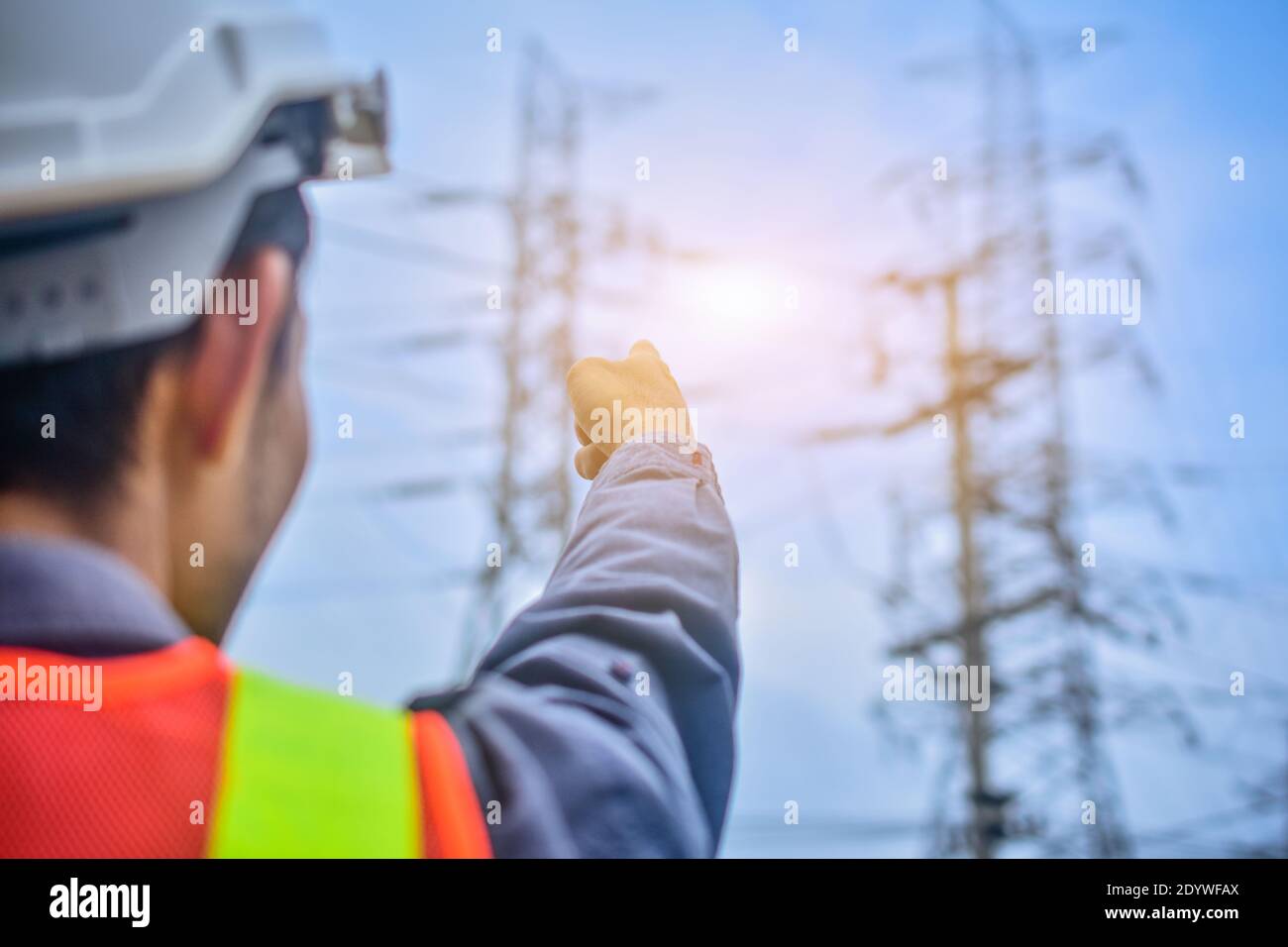 Engineer holding hand success at work Stock Photo - Alamy