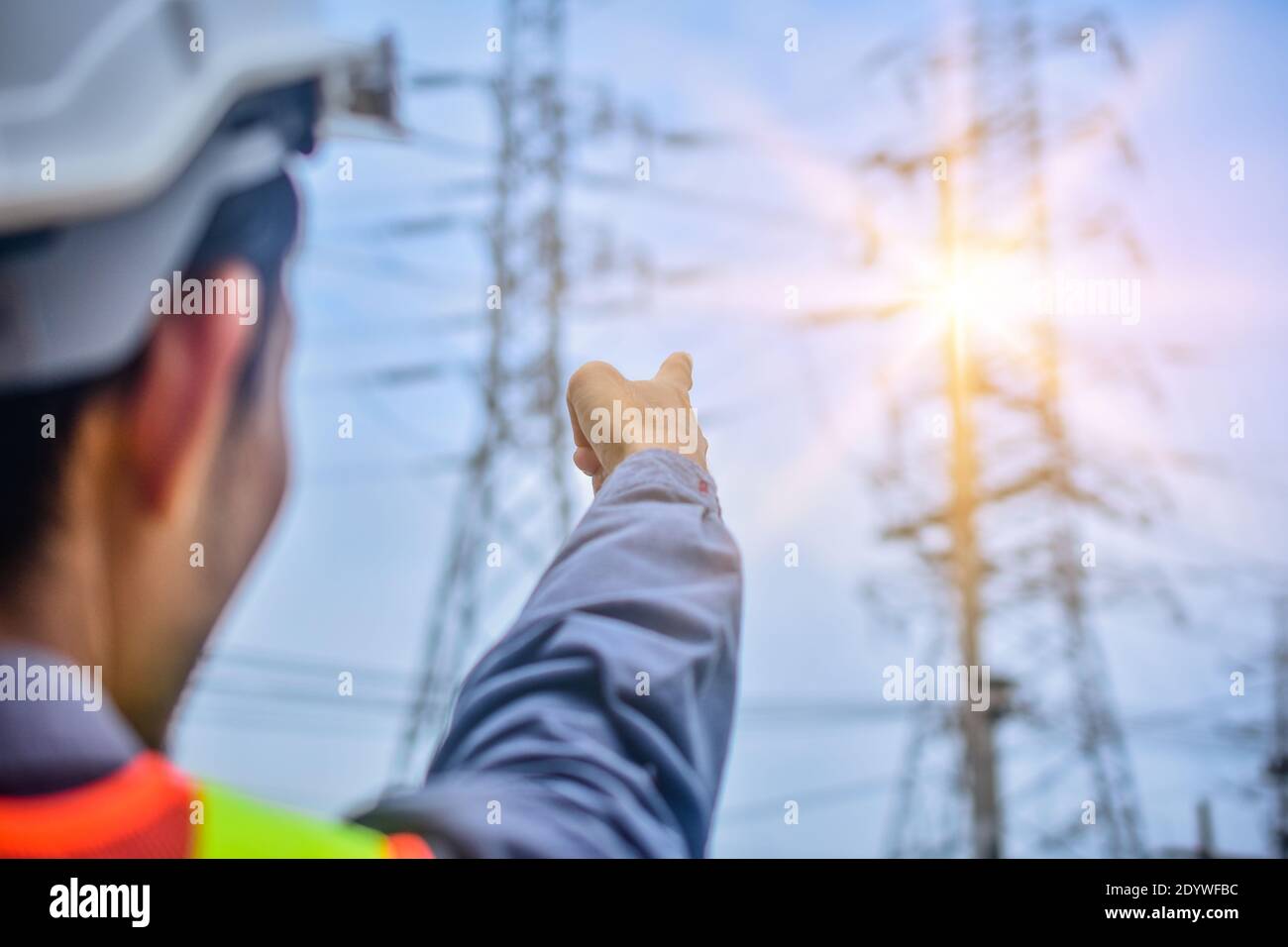 Engineer holding hand success at work Stock Photo - Alamy