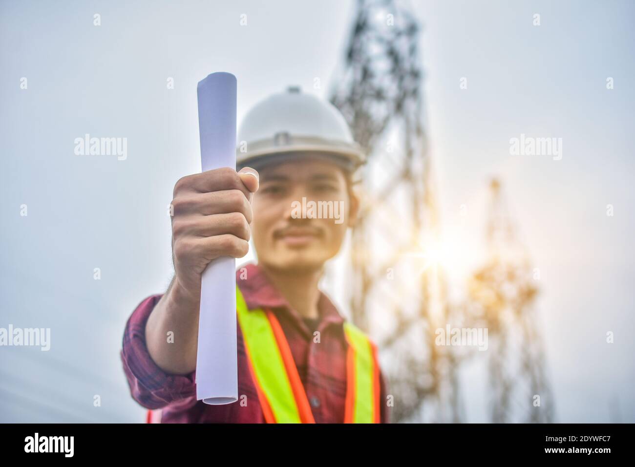 Close up hand holding paper,Engineer holding paper plan for using at ...