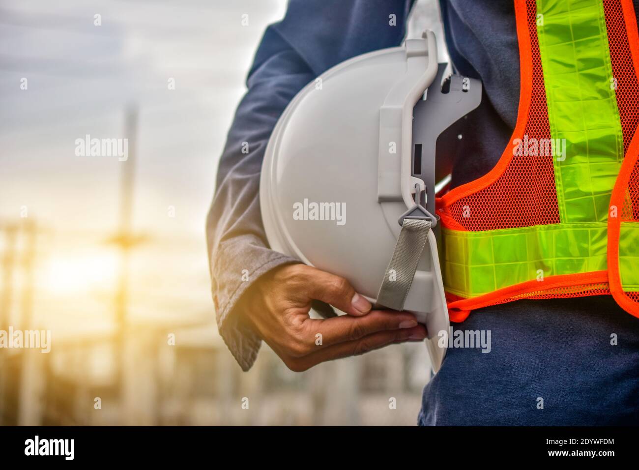 Engineer holding hard hat construction worker professional safety work ...
