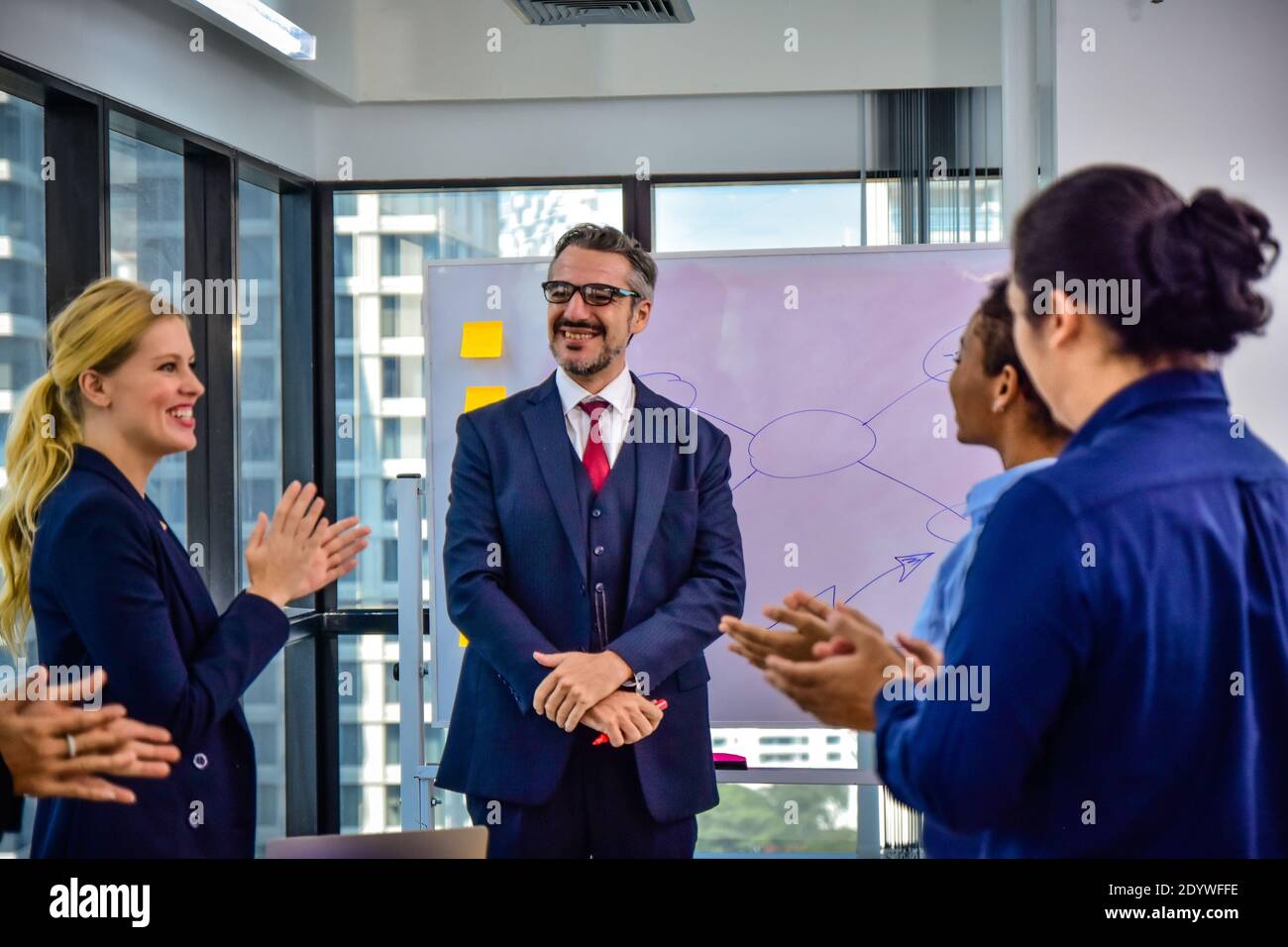 Business team working group meeting in office and Successful project ...