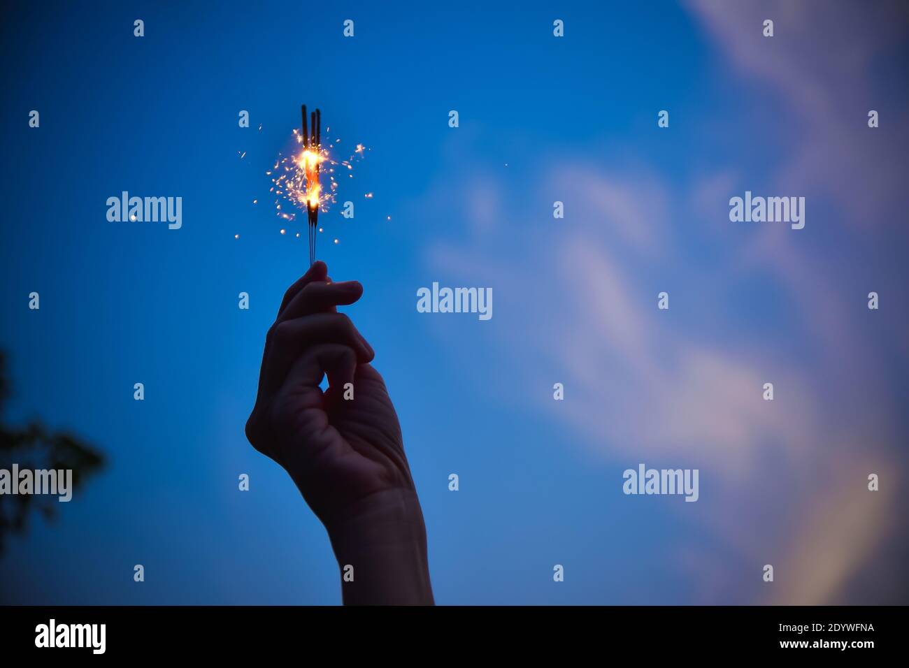 Hand holding firework are celebrating Christmas and Happy New Year.,X ...