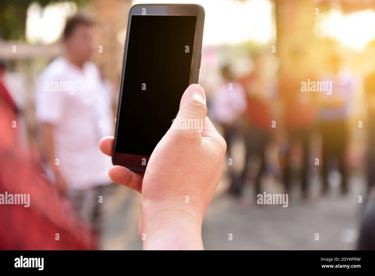 People holding Mobile Smart Phone Take Photo And Live VDO streaming ...