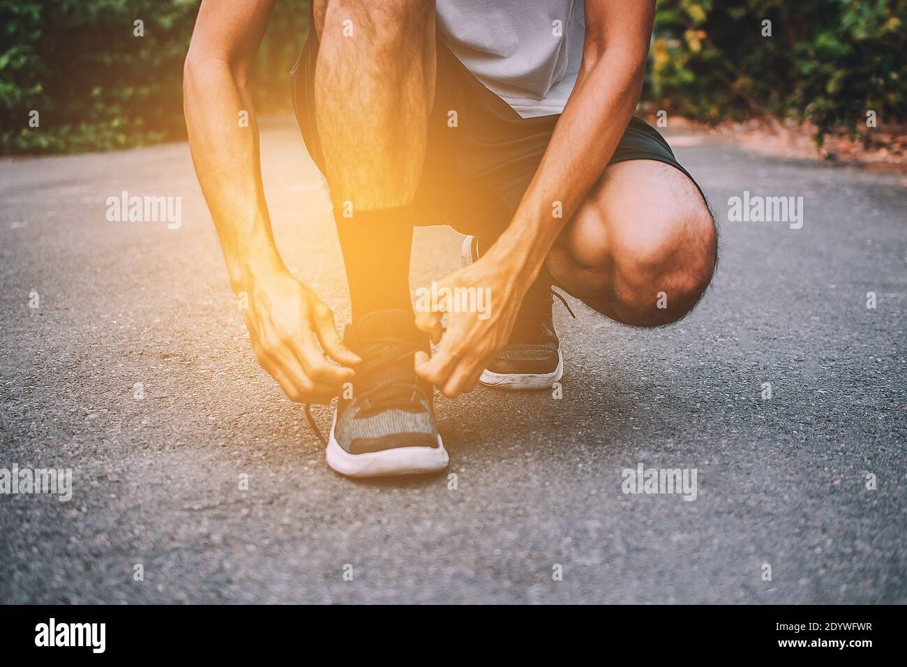 Man tied in shoes Running And go jogging,Sport Running Stock Photo - Alamy