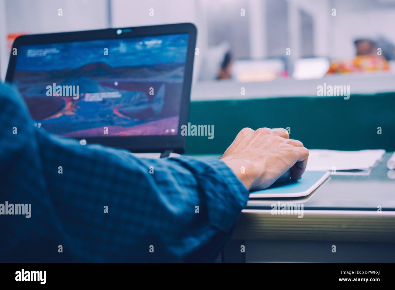 Man using computer in loft hi-res stock photography and images - Alamy
