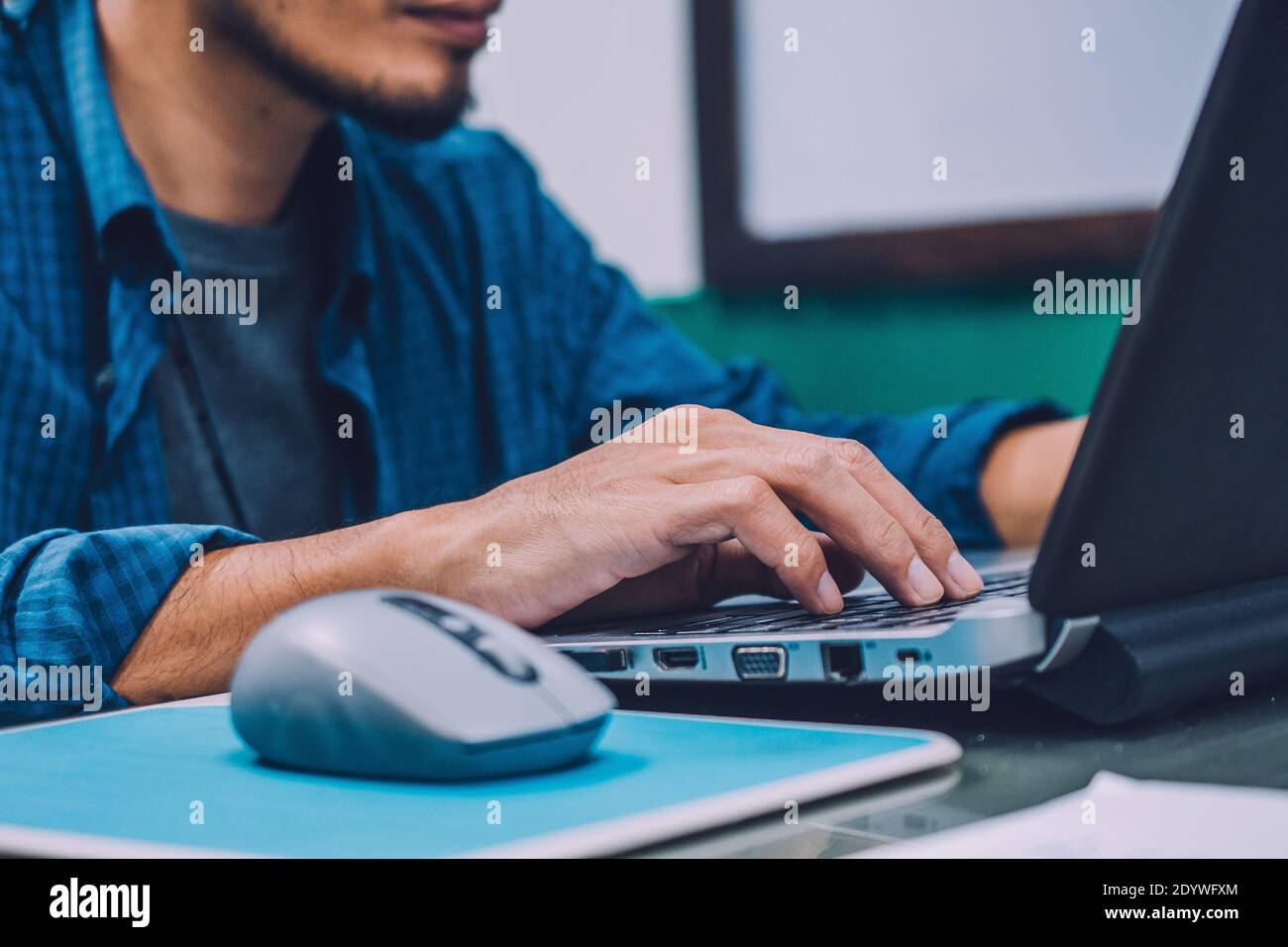 Man using computer in loft hi-res stock photography and images - Alamy