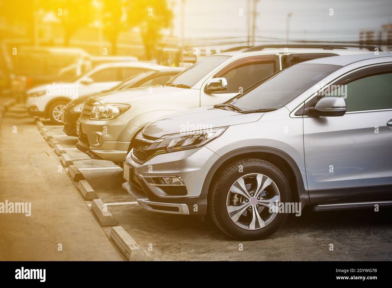 Car parked row in car park,Car parking on street Stock Photo - Alamy