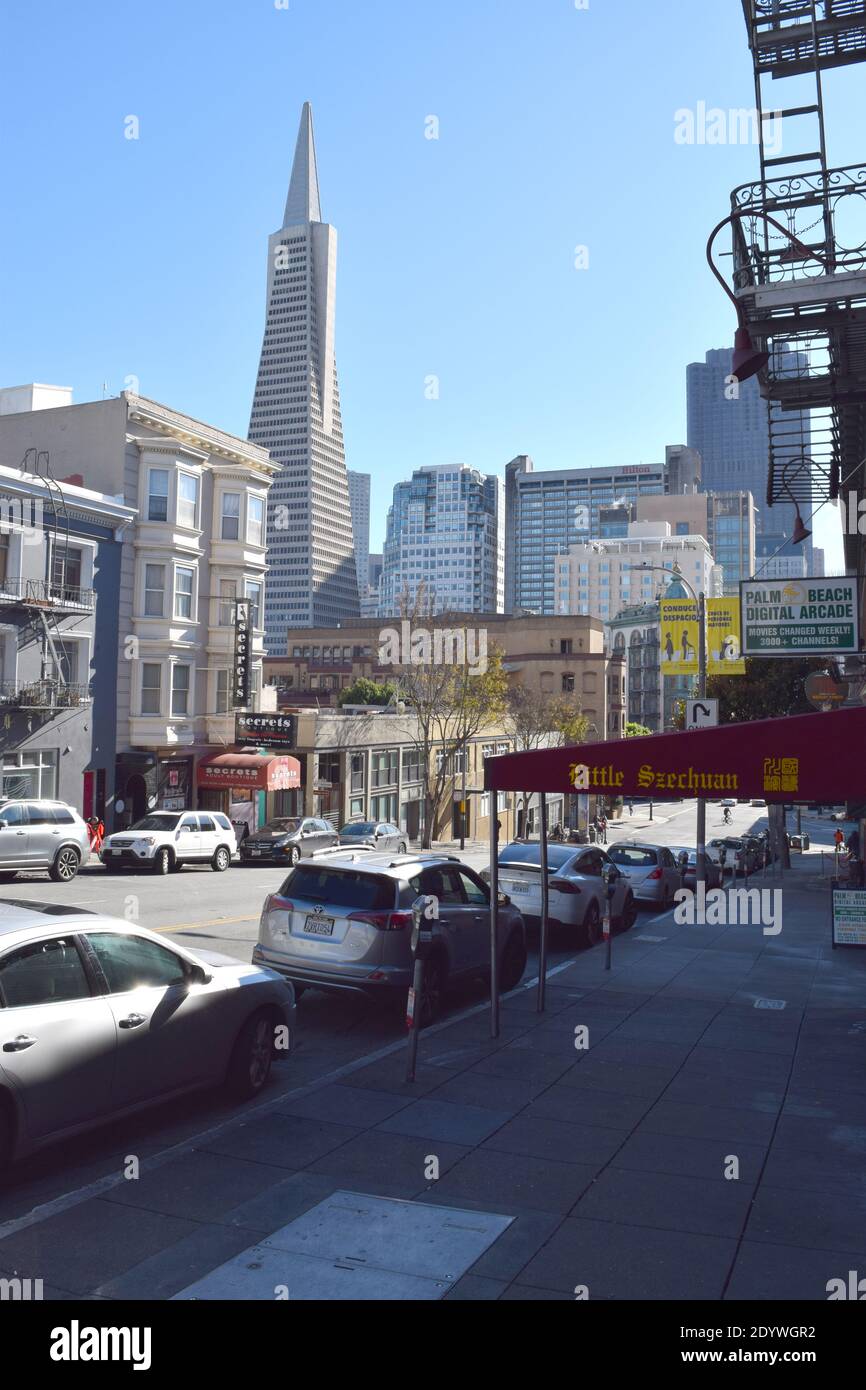 The Transamerica Pyramid looms over Columbus Street in San Francisco ...