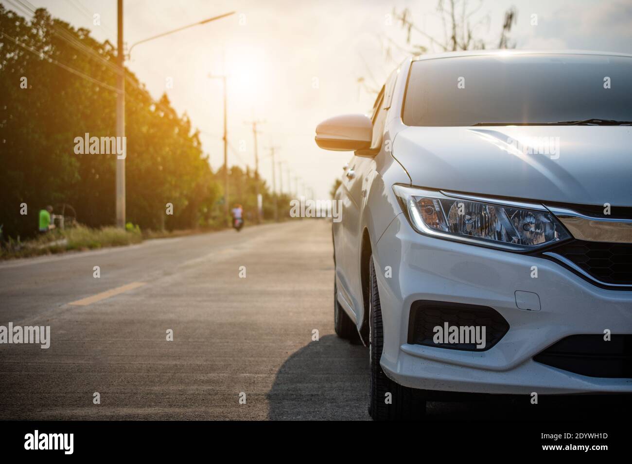 Close up front of car parked on the asphalt road Stock Photo - Alamy