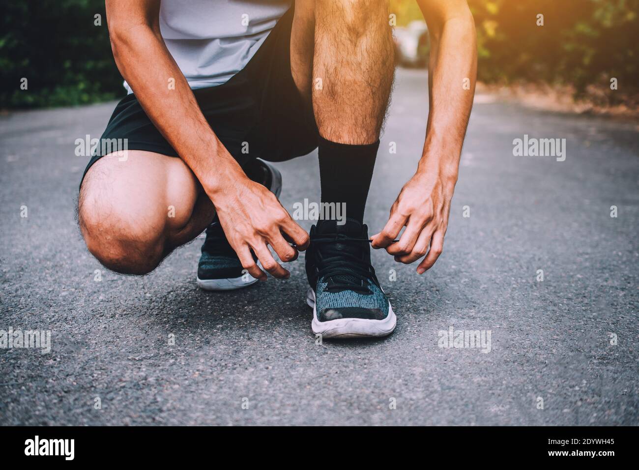 Runners tied in shoes,Man run on the street be running for exercise,Run ...