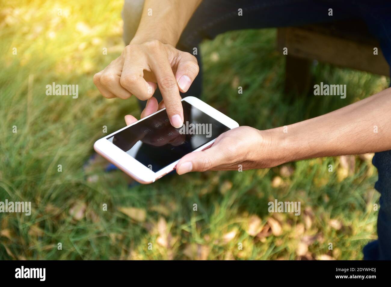 Man holding mobile smart phone using smart application by internet ...