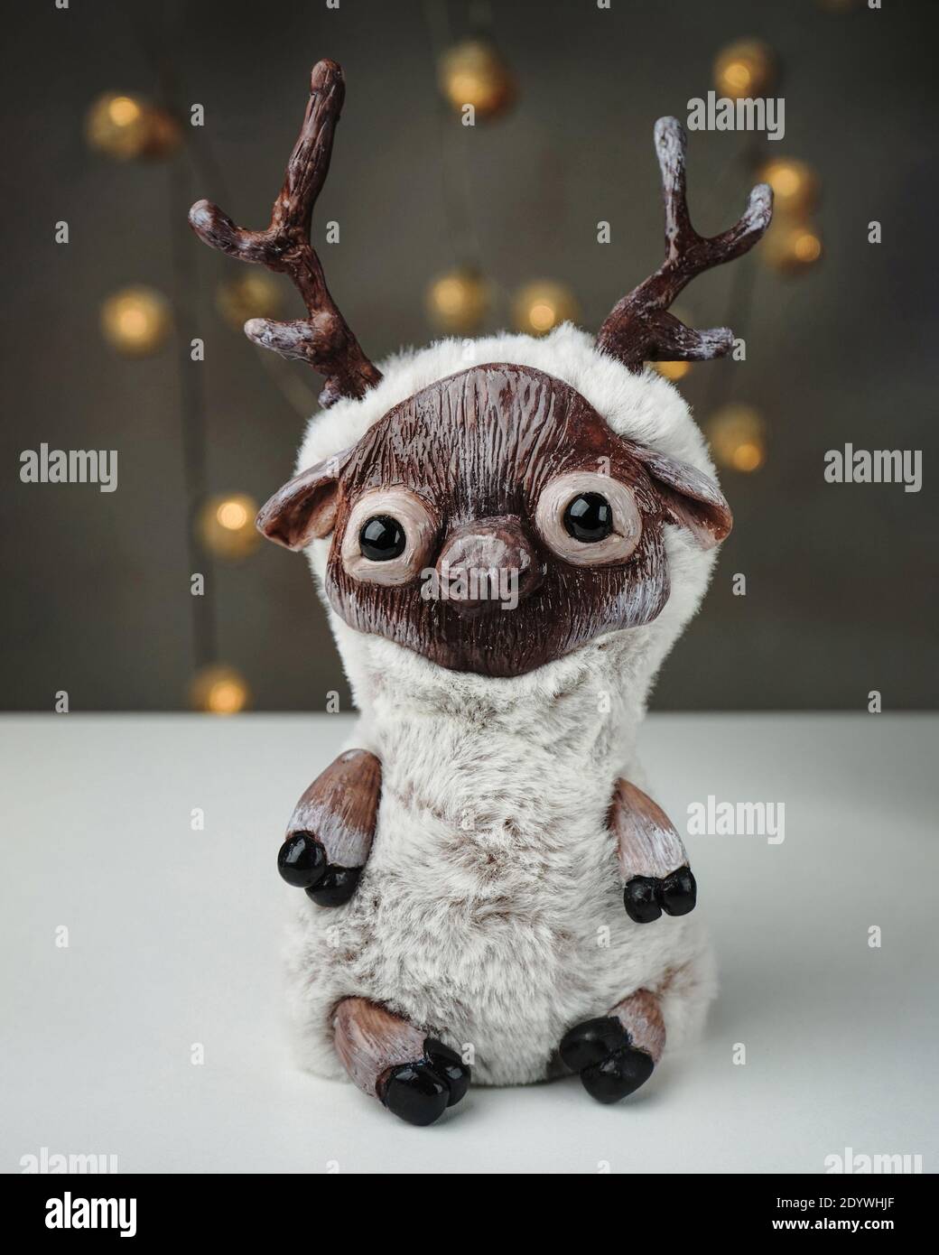 Handmade toy made of polymer clay fawn front view Stock Photo - Alamy