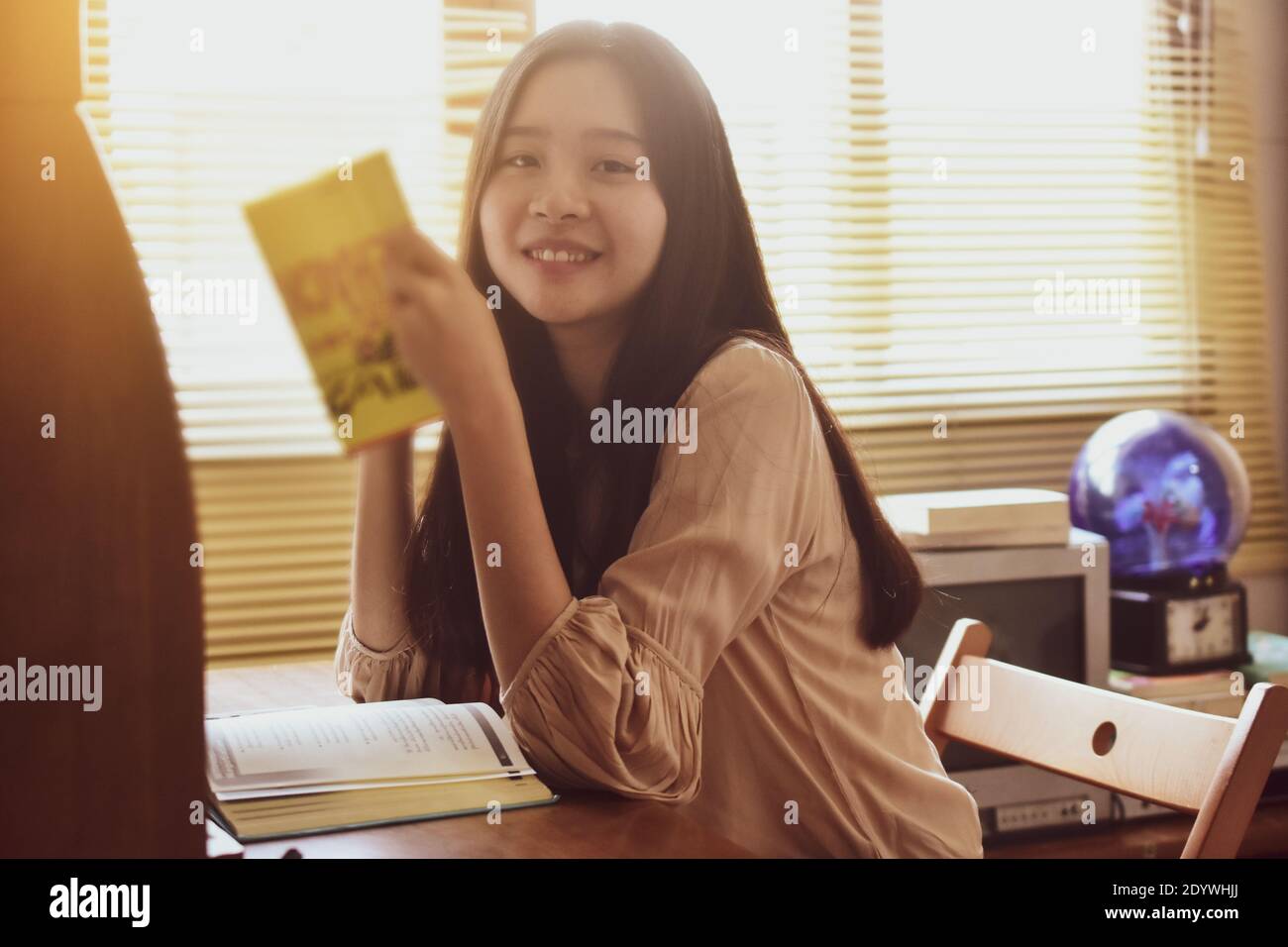 Blurry subject women reading in room Stock Photo - Alamy