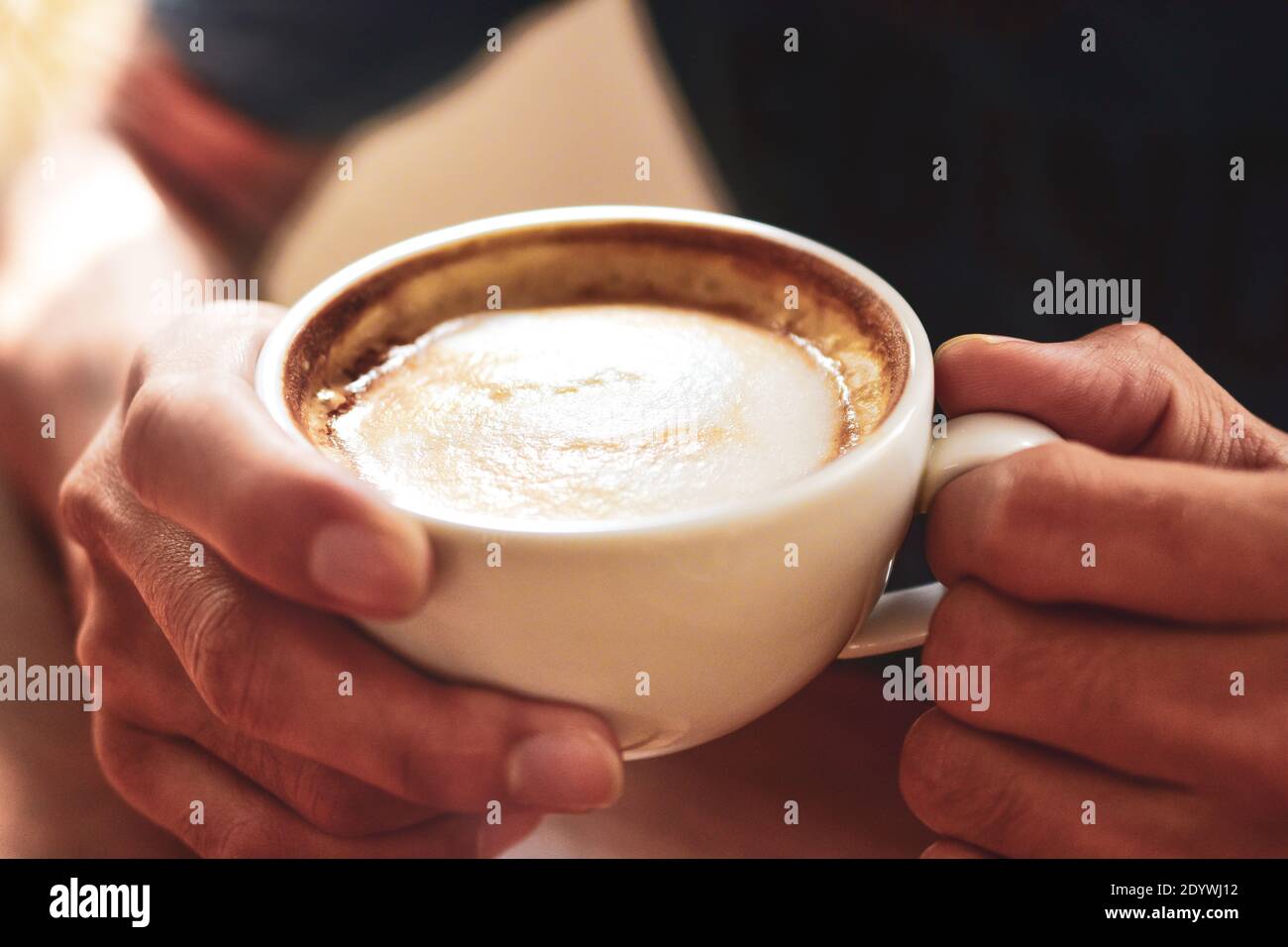 People Drinking Coffee Latte Stock Photo - Alamy