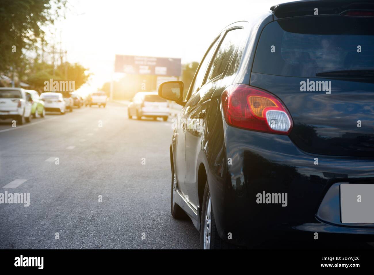 Car driving on road Stock Photo - Alamy