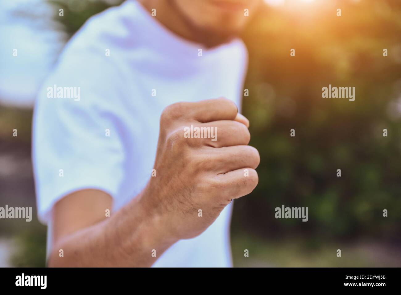 Man holding hand success Stock Photo - Alamy