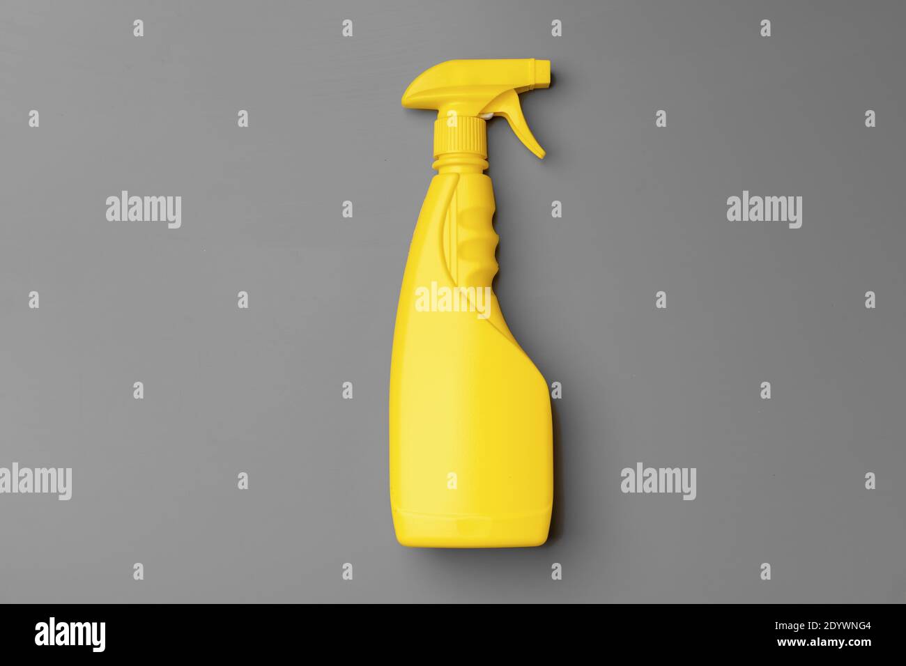 Yellow liquid detergents containers on gray background Stock Photo - Alamy