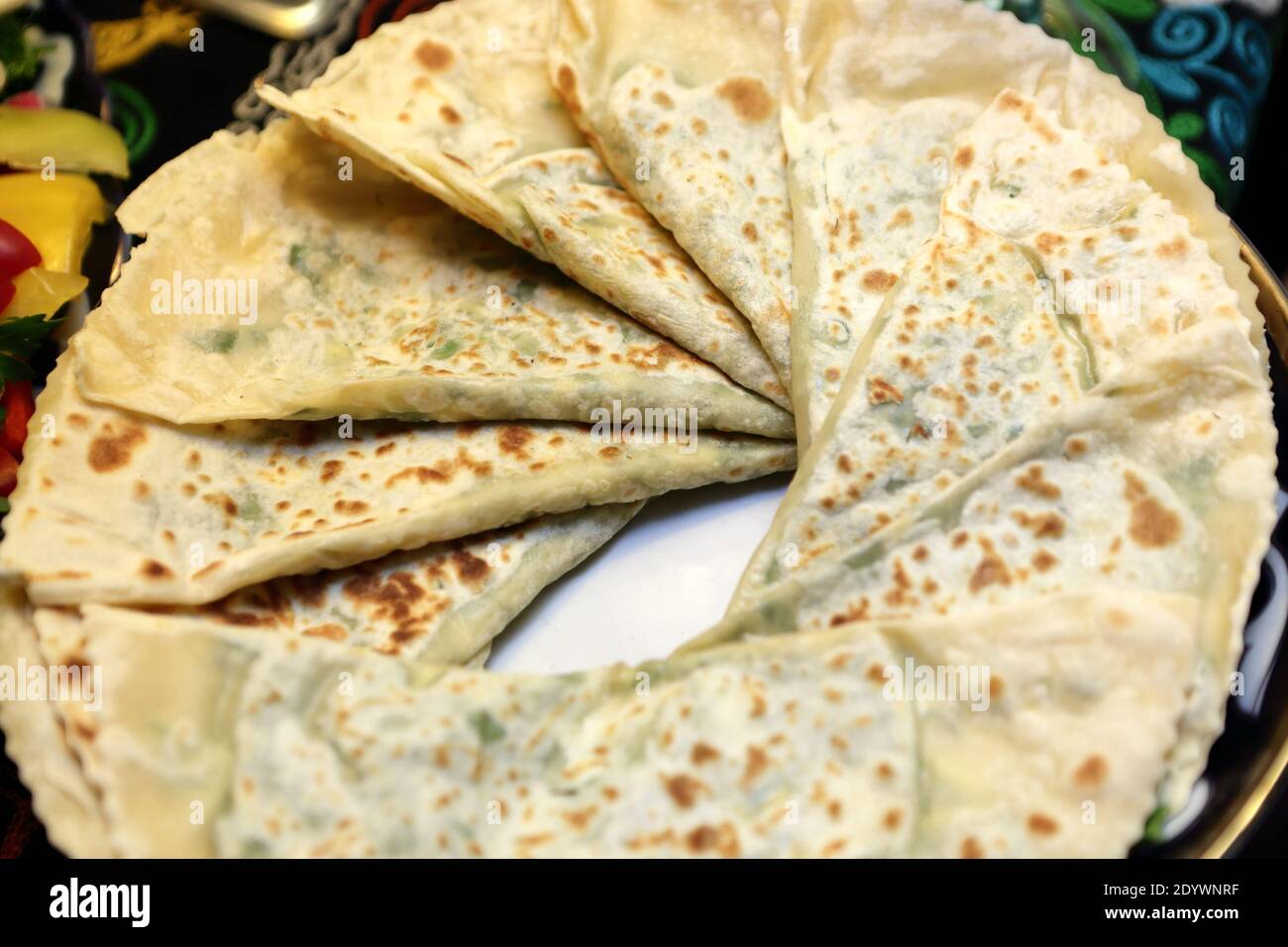 Plate with qutab in an asian restaurant Stock Photo - Alamy