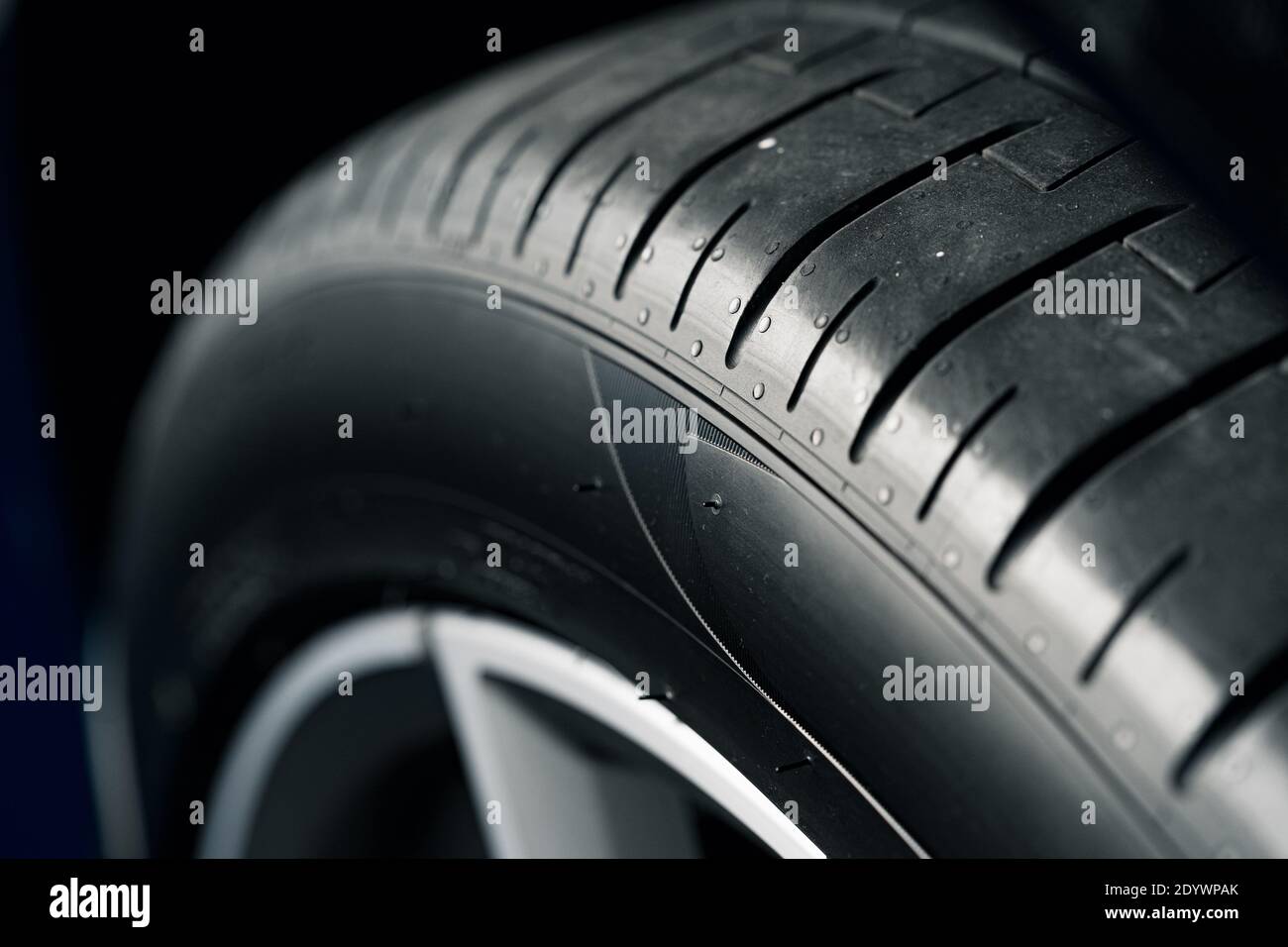 Close up of new car wheel tyre Stock Photo - Alamy