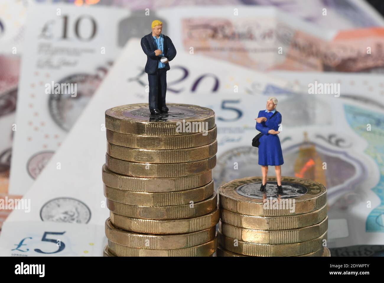 Undated file photo of models of a man and woman stand on a pile of ...