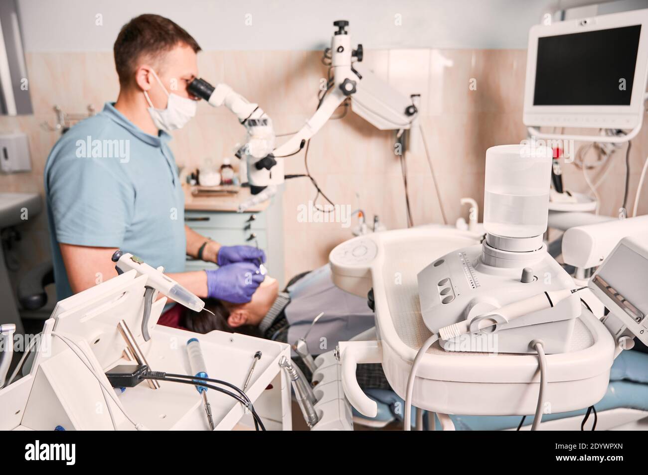 Dental treatment microscope hi-res stock photography and images - Alamy