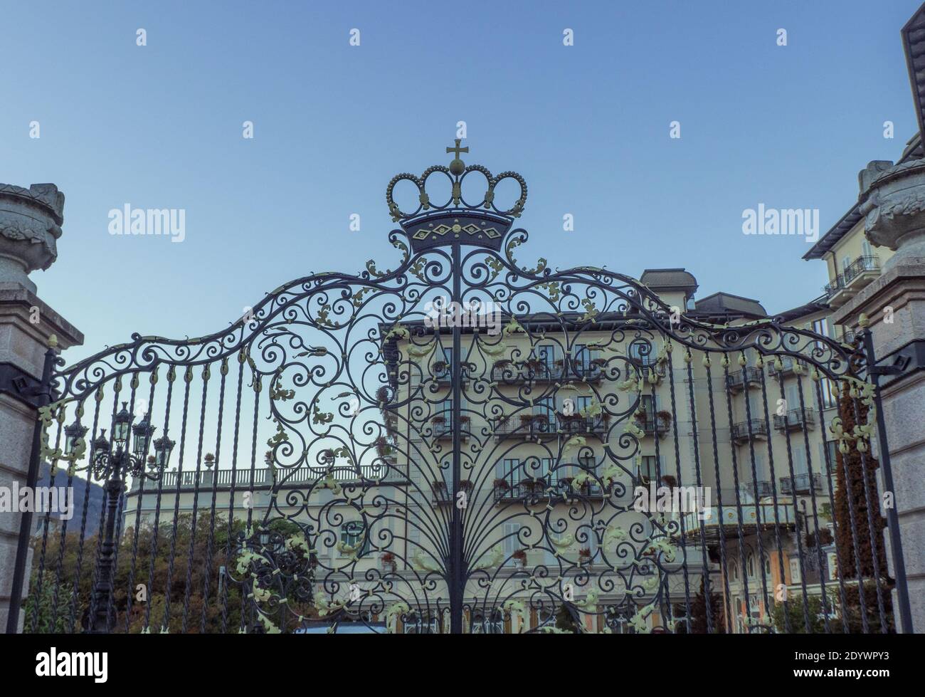 luxurious iron gate with golden decorations surmounted by a crown Stock ...