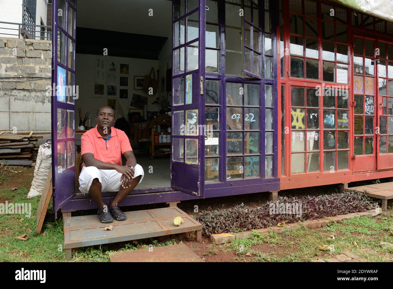 Nairobi, Kenya. 20th Oct, 2020. Artist Peterson Kamwathi sits outside ...