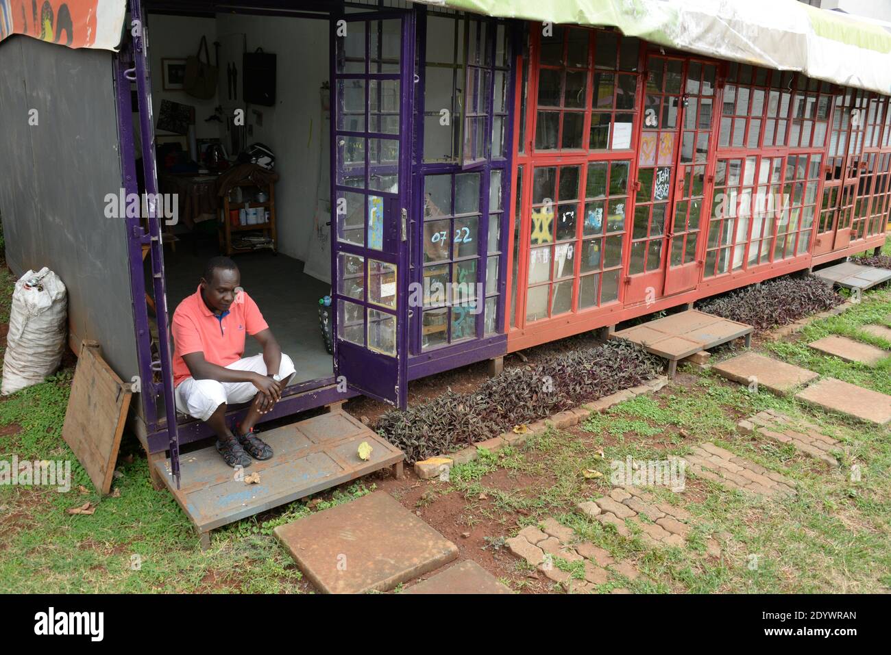 Nairobi, Kenya. 20th Oct, 2020. Artist Peterson Kamwathi sits outside ...
