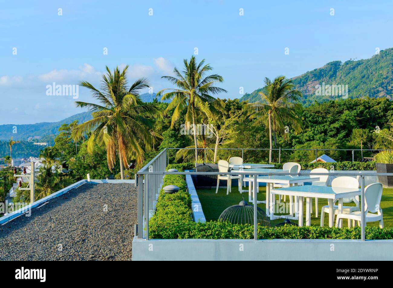 Table chairs on rooftop hi-res stock photography and images - Alamy