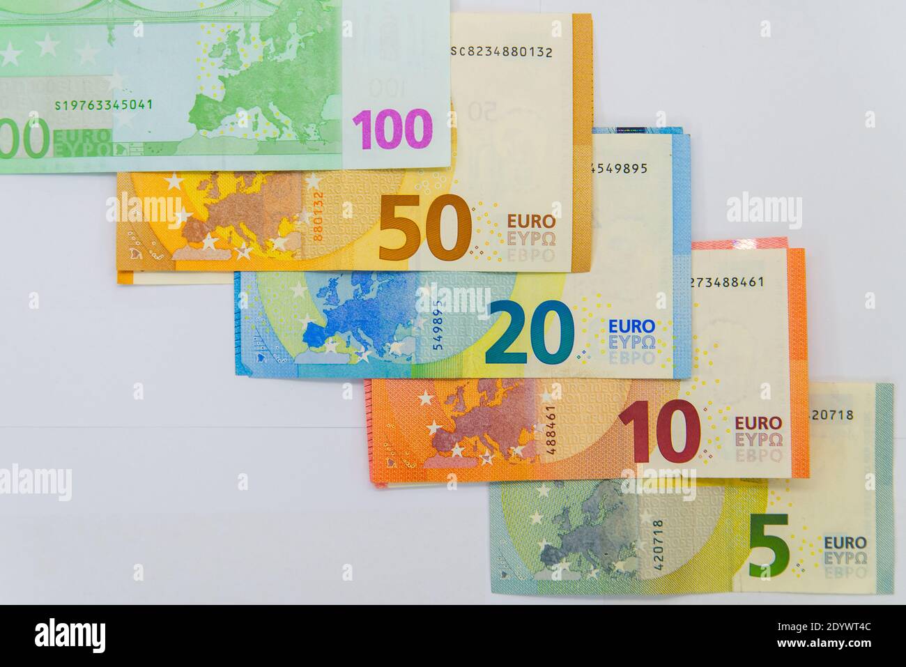 Euro banknotes with different nominal on white background Stock Photo ...