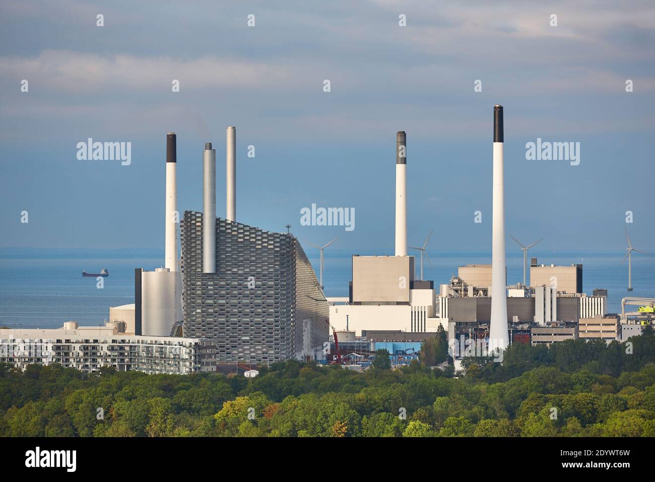 Clean sustainable power station. Electricity and heating. Windmill sea ...