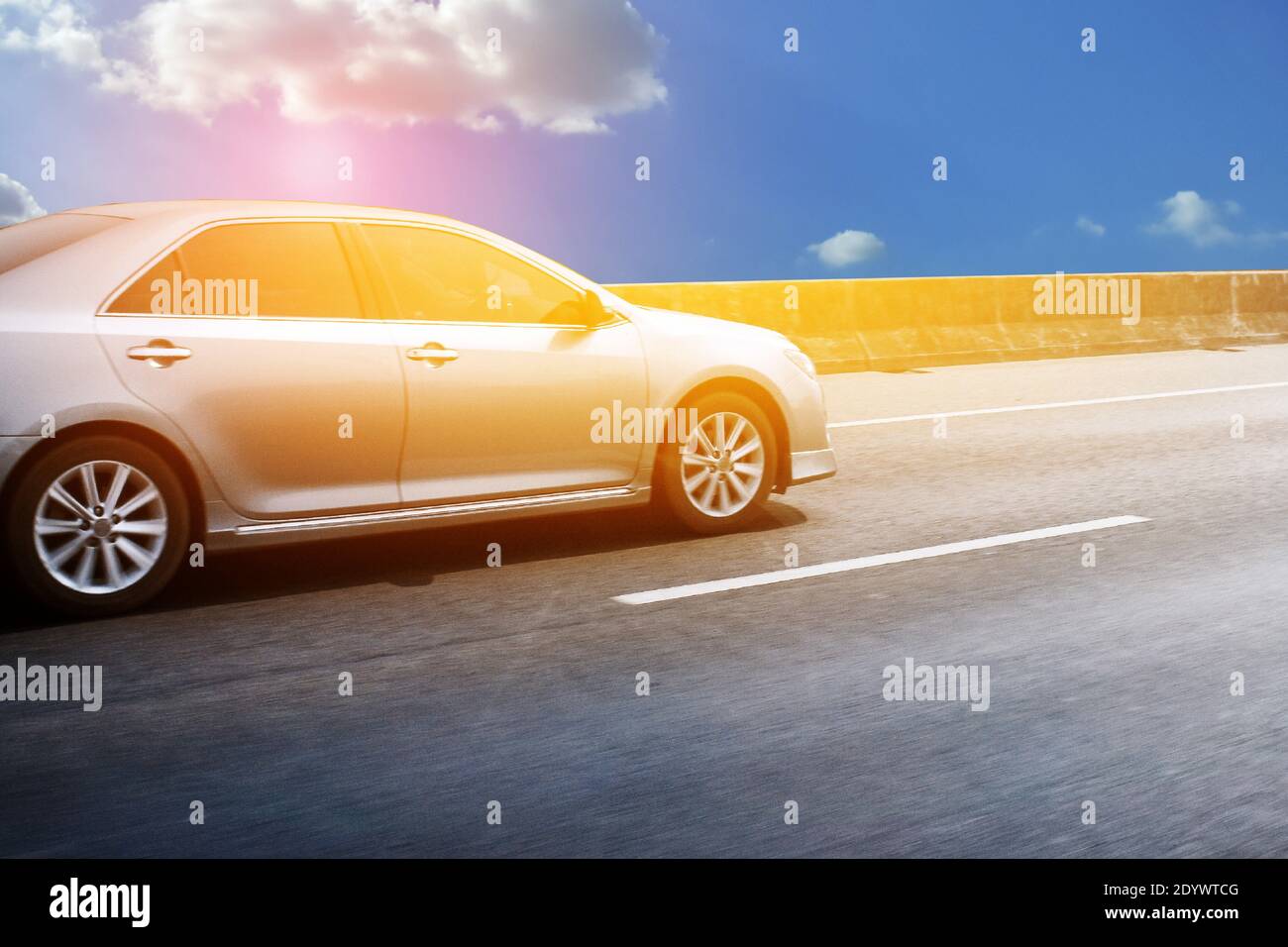 car driving on high way road see sky view and copy spec on bottom of ...