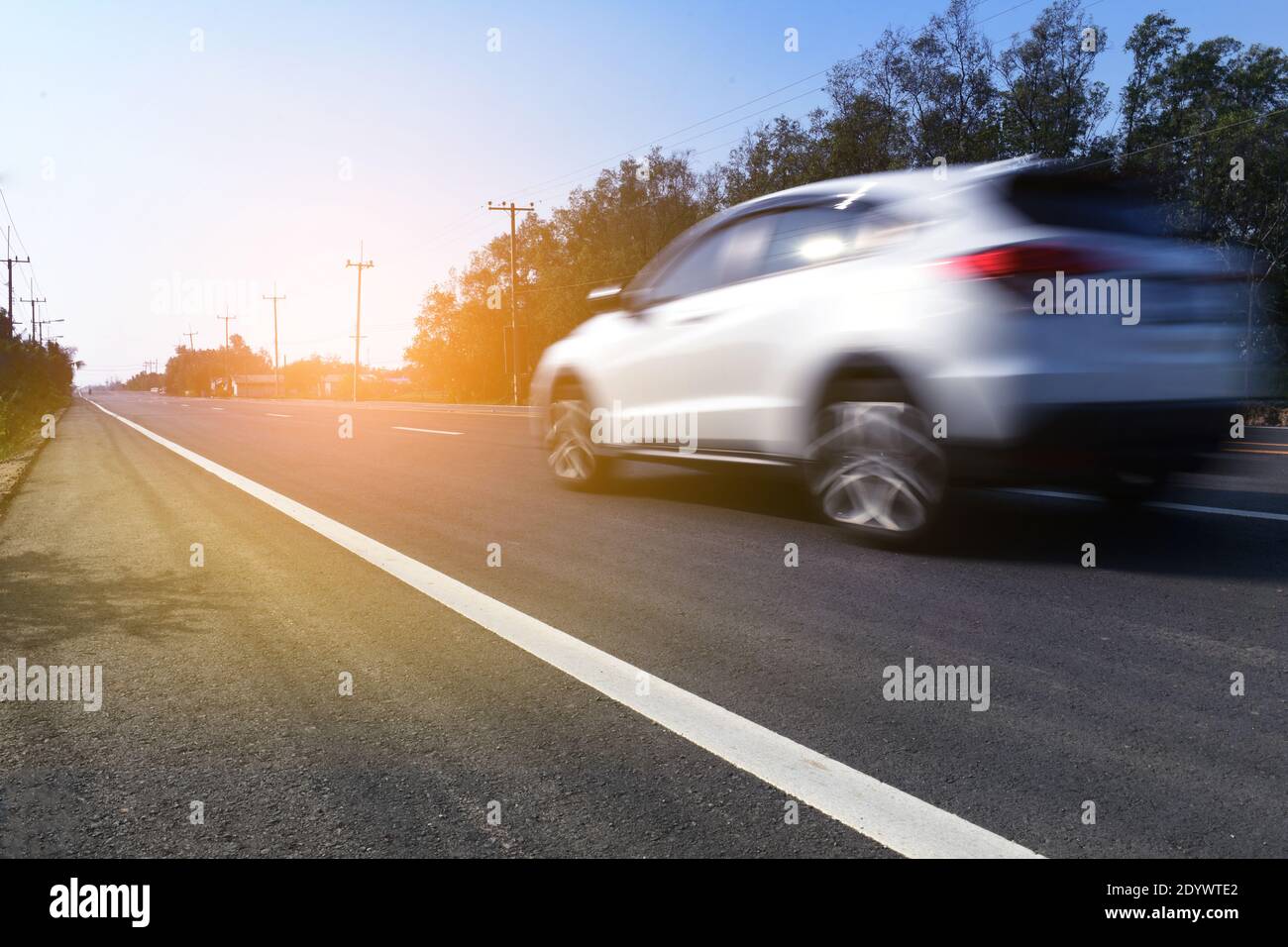 Cars are driven on high speed roads. The road stretches forward. There ...