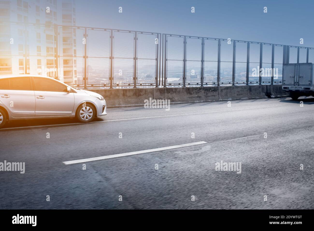 car driving on high way road see sky view and copy spec on bottom of ...