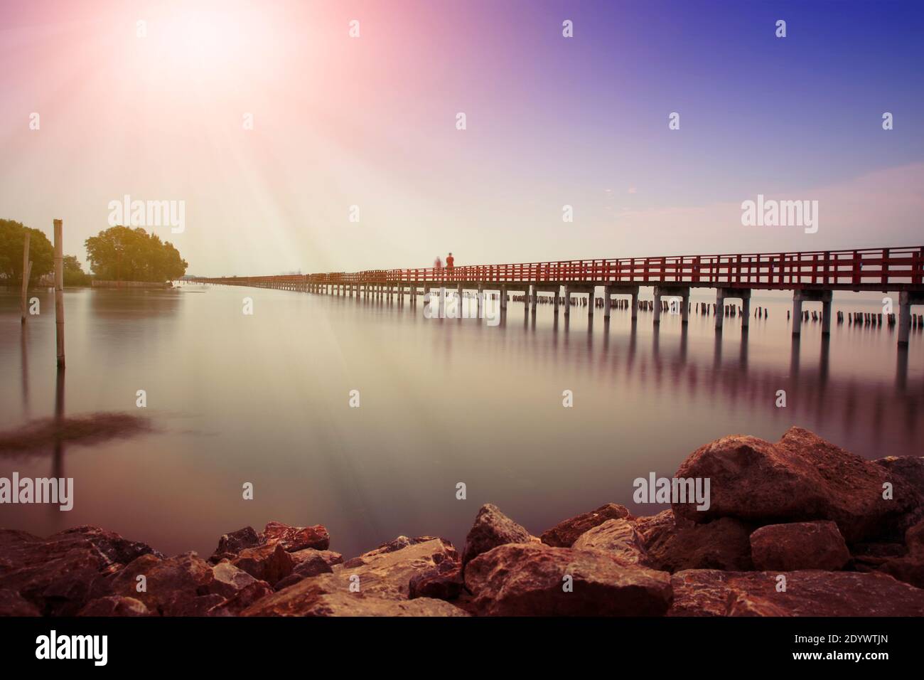 Long Red Bridge sunlight sky tree at beach sea,Red bridge Samut Sakhon ...