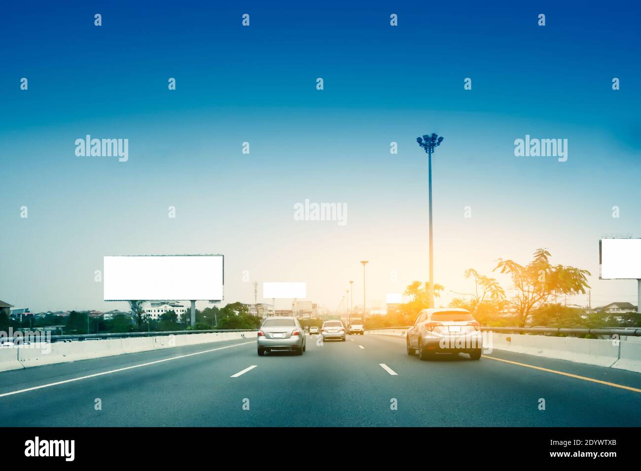 Car driving on street at sunset,Transportation on road concept Stock ...