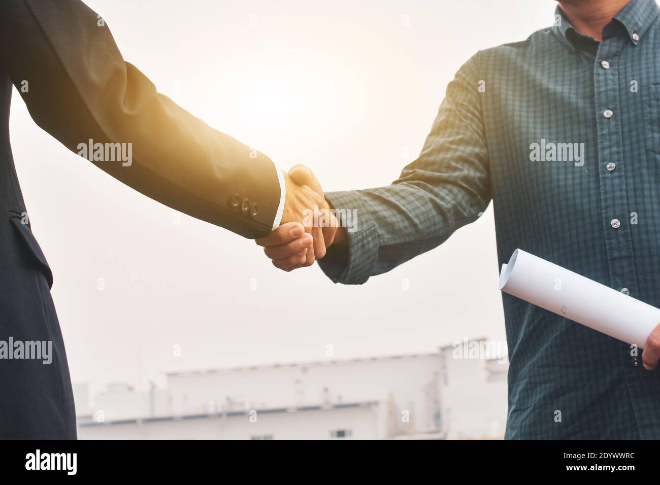 Engineer shake hands agreement construction project success Stock Photo ...