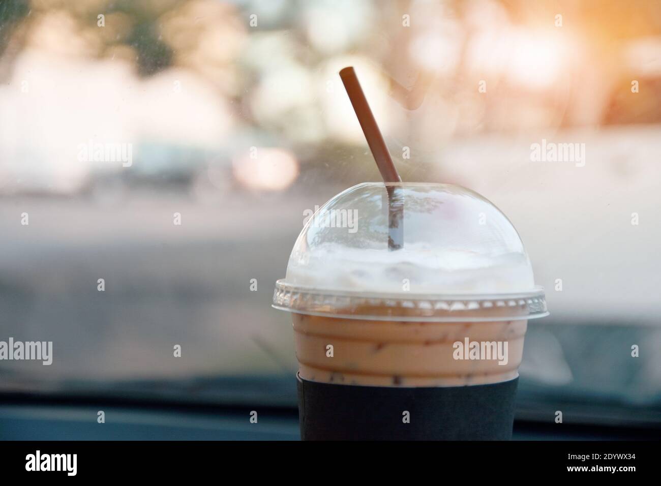 cool coffee in car parked on road for drink before drive Stock Photo ...