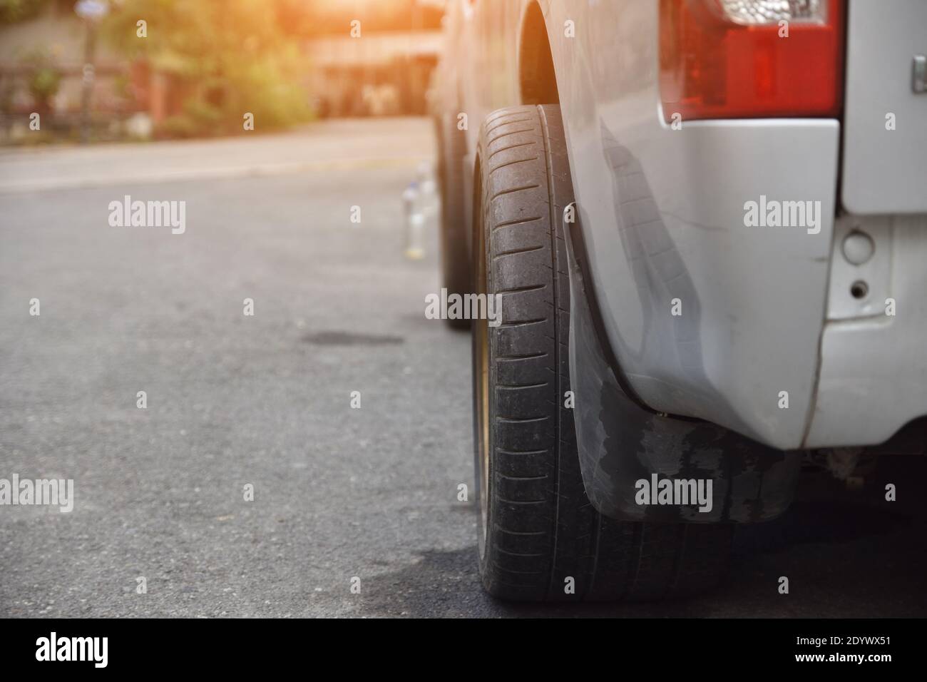 Pick up the wheels from the car in the wrong way,Car on street,car ...