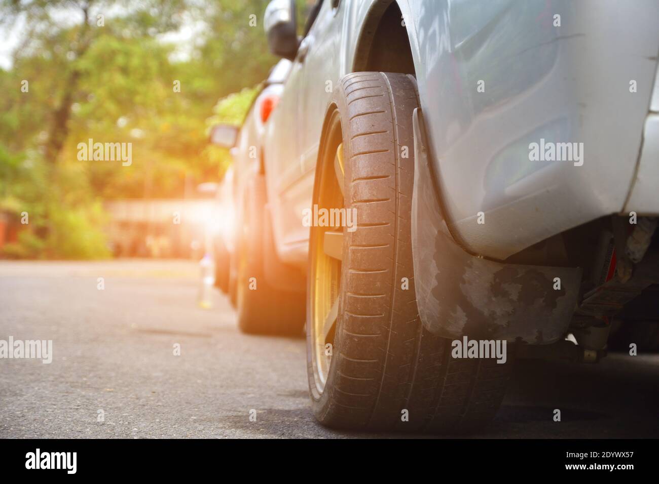 Pick up the wheels from the car in the wrong way,Car on street,car ...