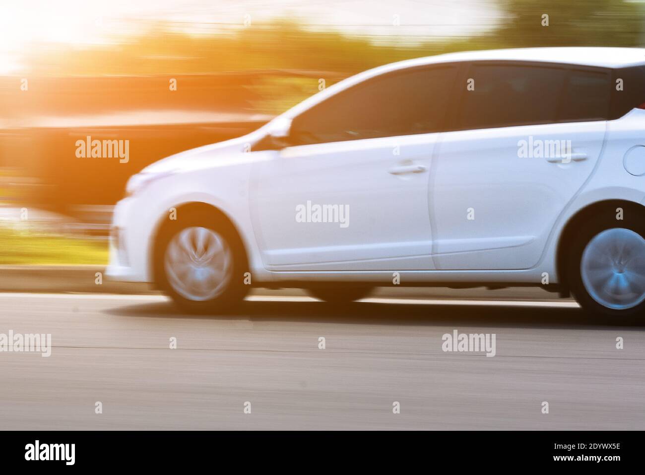 Blurry Car driving on road,car high speed on road,highway and ...